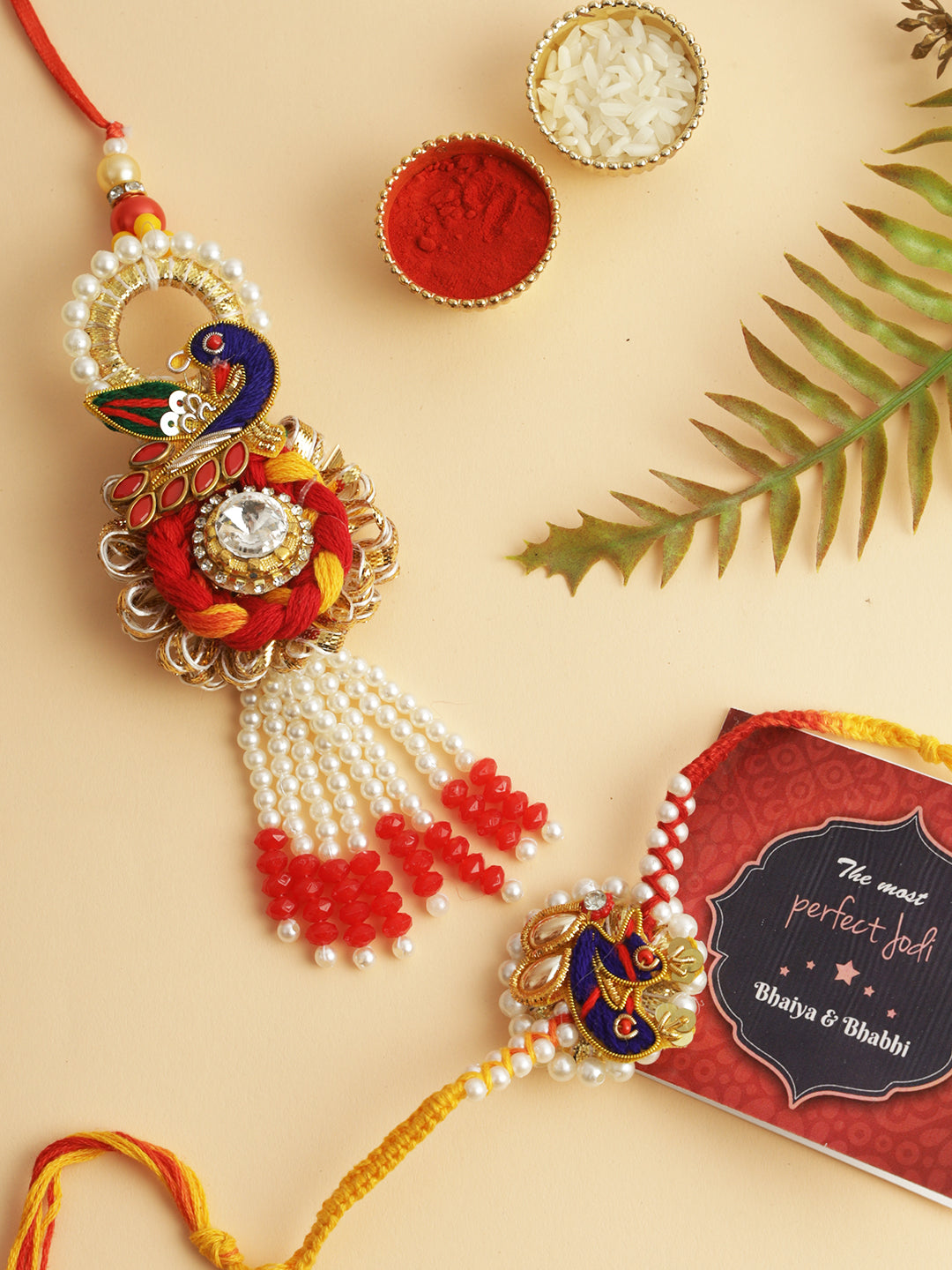 Buy | Rakhi for Brother and Bhabhi with Rakhi Card and Roli Chawal Tika ...
