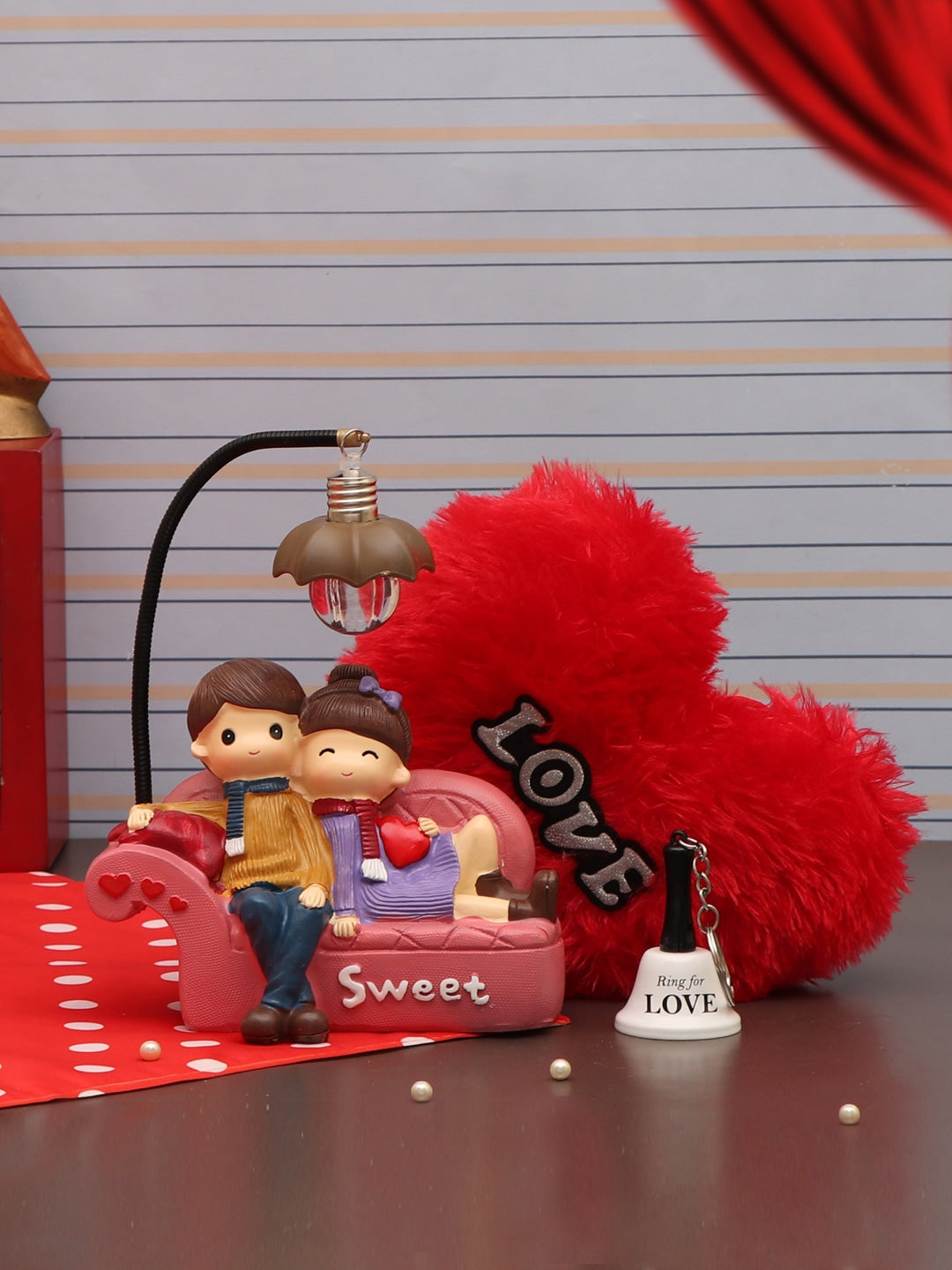 Buy | Red Romantic Couple Showpiece with Bell | Tied Ribbons